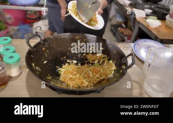 Chef preparing traditional food in Vietnam. Local restaurant in ...