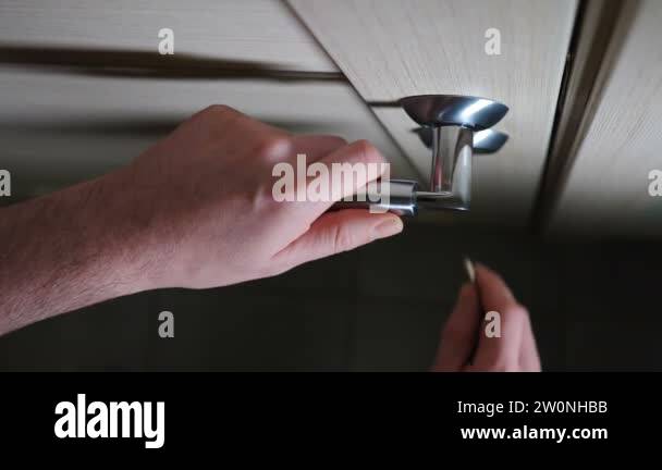 Male hands opening wooden door turning key to unlock office door. Top ...