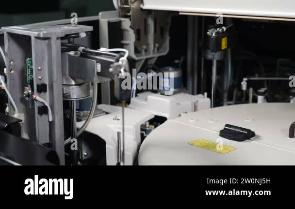 Healthcare concept. Professional blood chemistry analyzer with moving ...