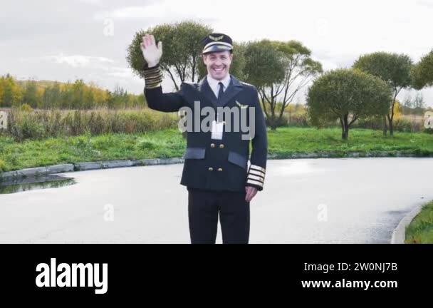 pilot welcomes waving commander airline aviator Stock Video Footage - Alamy