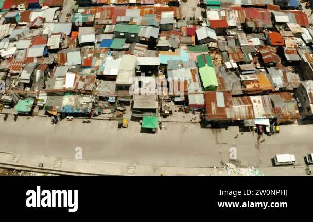 Streets of poor areas in Manila. The roofs of houses and the life of ...