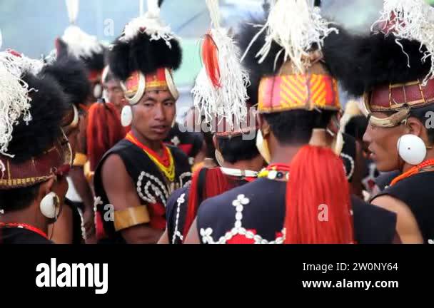 Chang tribesmen dressed in traditional costume and dancing at the ...