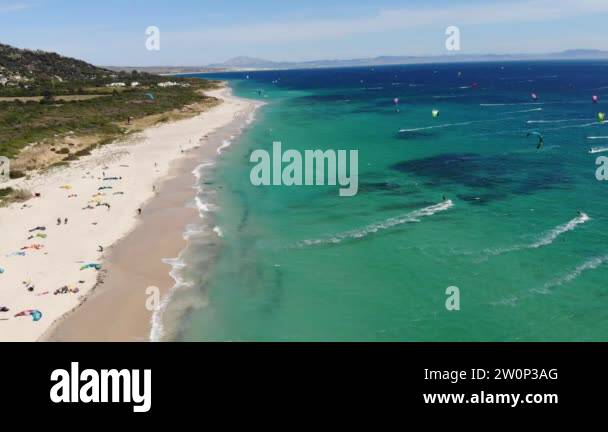 Huge sandy beach, beautiful Atlantic Ocean Coast with light sea waves ...