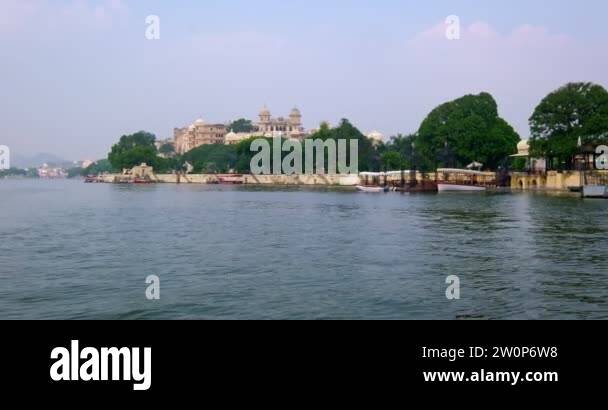 Udaipur City Palace view from moving boat on lake Pichola. Luxury ...