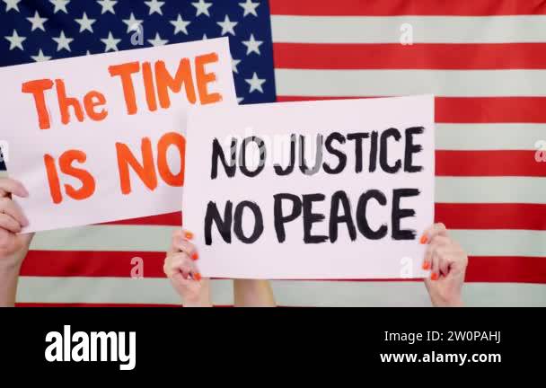 Protesters hold banners with slogans - The Time is now. NO JUSTICE NO ...