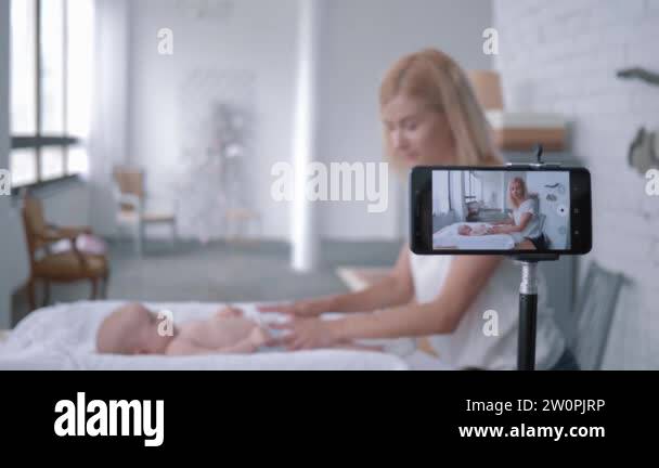 Diaper change girl Stock Videos & Footage - HD and 4K Video Clips - Alamy