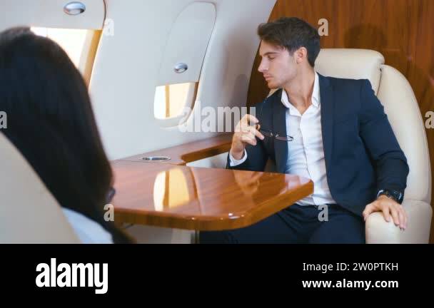 Handsome Rich Man Flying in Private Jet Plane. Young Confident ...