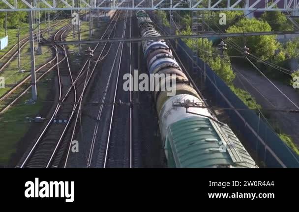Freight train carries cargo. View of the train from above. Rail transport for intercity trade ...
