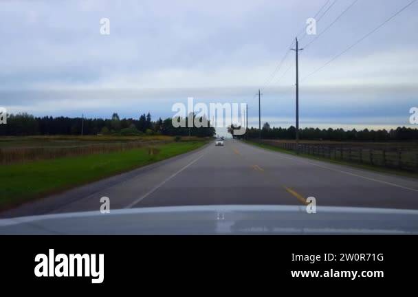Rear View From Back of Car Driving Rural Countryside Road With Rear ...