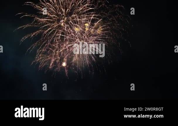 Festive fireworks over the city. Joyful screams of people. Bright ...