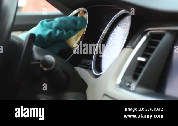 Wipe the steering wheel, the dials and instruments of the car with a ...