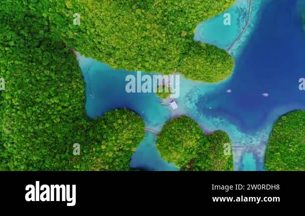 Tropical landscape rainforest hills and azure water in lagoon with ...