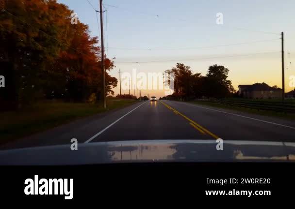 Rear View From Back of Car Driving Rural Countryside Road With Traffic ...