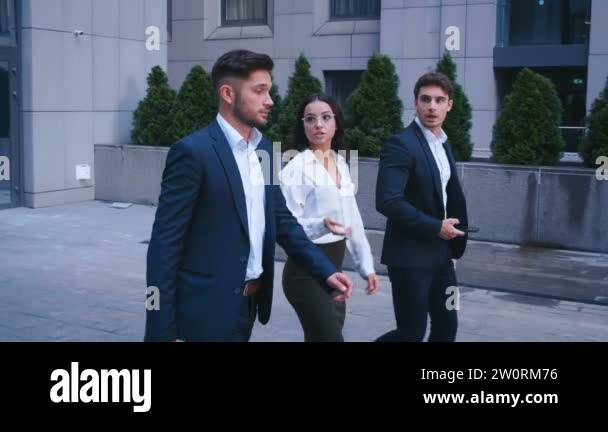 Successful Business People Male and Female Walking near the Modern ...