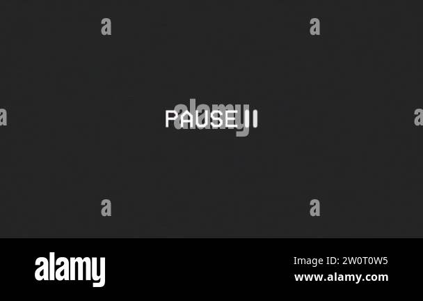 A capture of a VCR playing and pausing a VHS blank tape: the text Pause ...