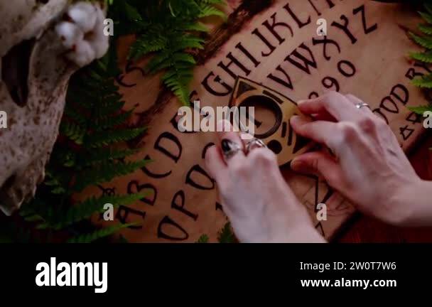 Ouija board black Stock Videos & Footage - HD and 4K Video Clips - Alamy
