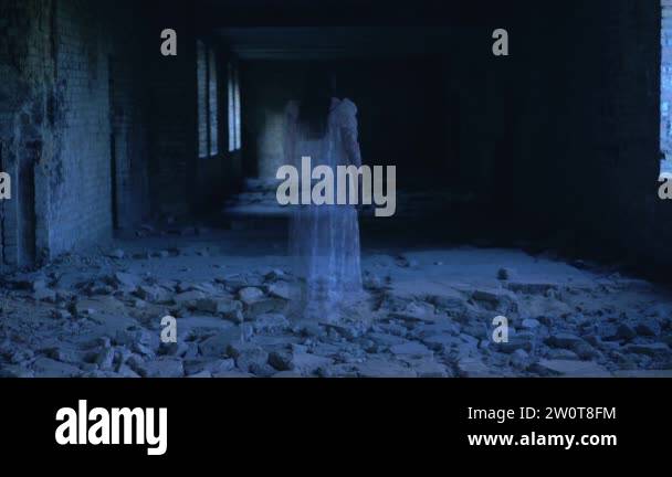 Female ghost walking and disappearing in old abandoned building, spirit ...