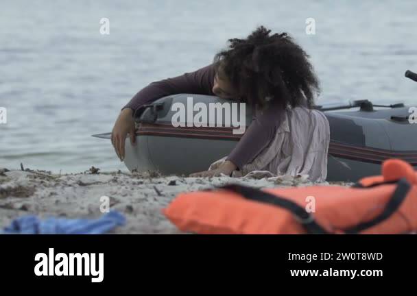 Exhausted woman in lifeboat survived after shipwreck, catastrophe ...