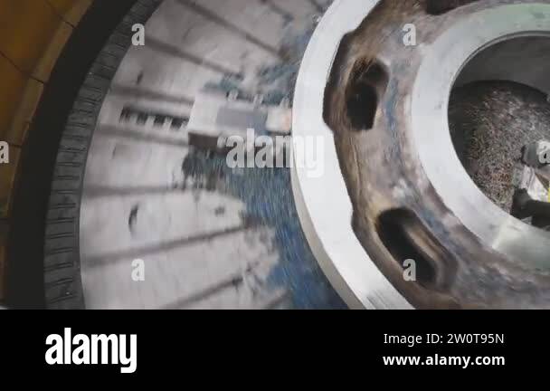 Milling machine cutting the sample part. Turning lathe in action.Facing ...