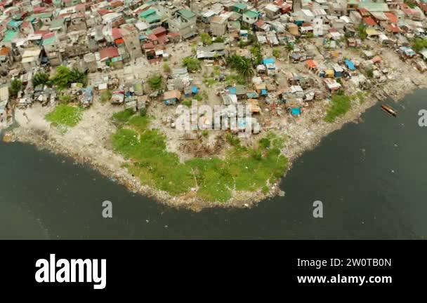 Slums in Manila, a top view. Sea pollution by household waste Stock ...