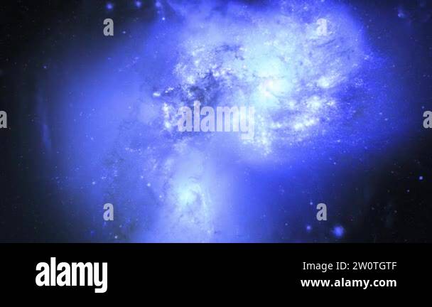 Space background. Camera is flying through the blue nebula. The stars ...