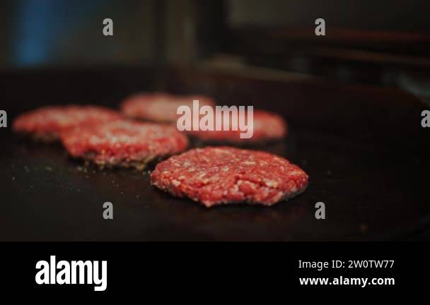 Tasty Close Up Footage of a Meat Patty Being Prepared on a Griller ...