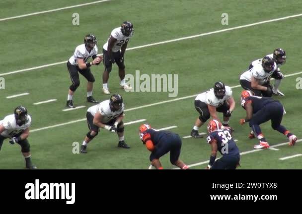Running the football Stock Videos & Footage - HD and 4K Video Clips - Alamy