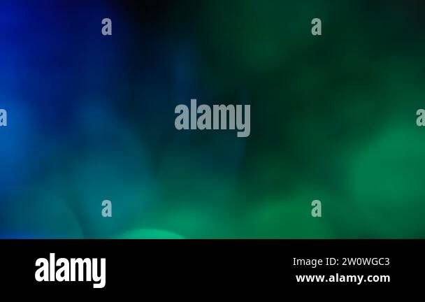 Colorful light pulses and glows color changing RGB on dark background ...