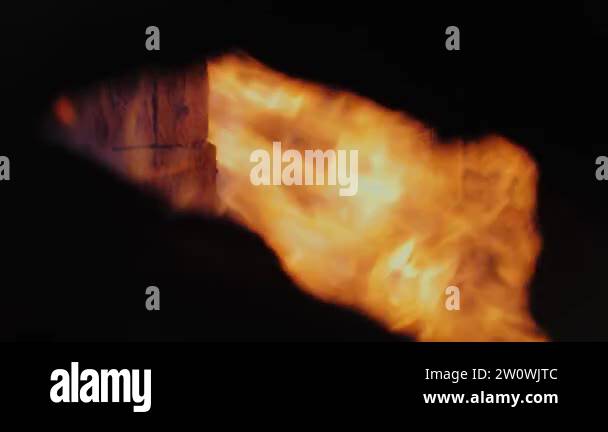 Process of brick burning in an industrial kiln. Fire flame burns brick ...