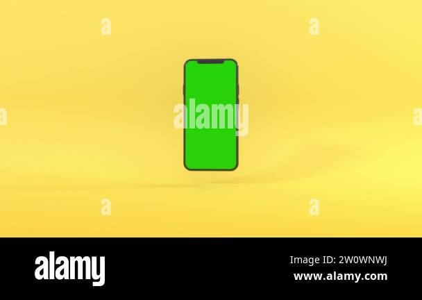 3D render of smartphone falling from up and rotating. Green screen on ...