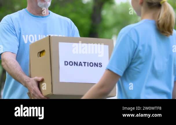 Giving charity box Stock Videos & Footage - HD and 4K Video Clips - Alamy