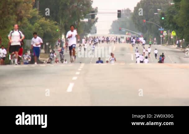 Runners cross the finish line Stock Videos & Footage - HD and 4K Video ...