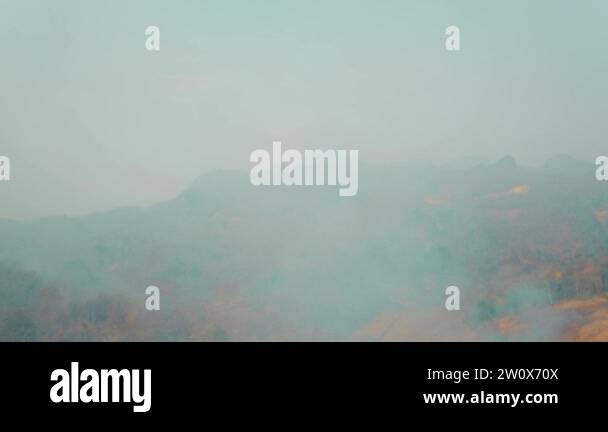 Smog of forest fires. Deforestation and Climate crisis in Asia. Toxic ...