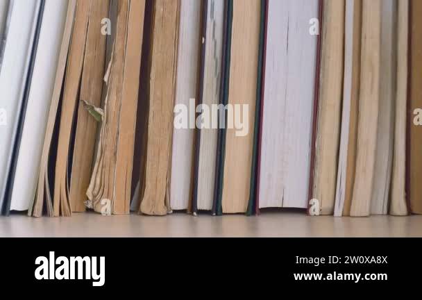 Left books Stock Videos & Footage - HD and 4K Video Clips - Alamy