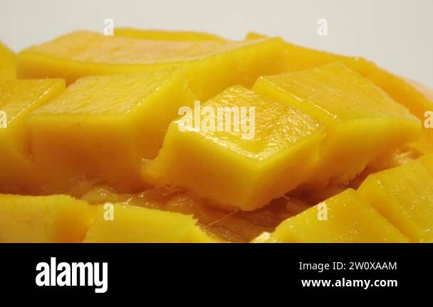 4K Sweet thai mango rotation of rip mango slice cubes cut Stock Video ...