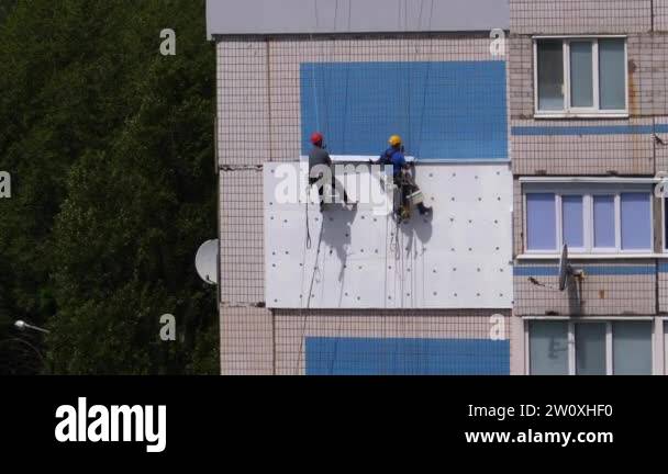 Two Industrial Climber, Insulation Facade of High-rise Building Using ...
