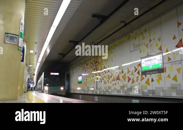 Tokyo / Japan - April 21, 2018: Train arrives at Meiji-jingumae ...