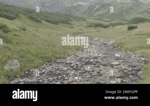 valley with rivers with rocks in the High Tatras , This clip is ...