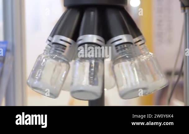 Rotary sample divider for analytical measurement of solid materials ...