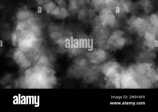 Puffy puffs of smoke on an isolated black background. Overlay VFX ...