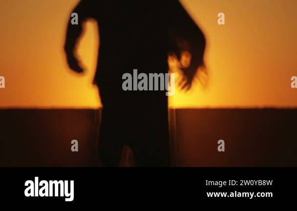 Islamic warrior with Kalashnikov at sunset day. Muslim fighter is ...