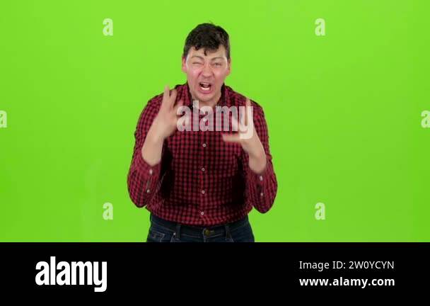 Aggressive man, he is angry at all and can not be stopped. Green screen ...