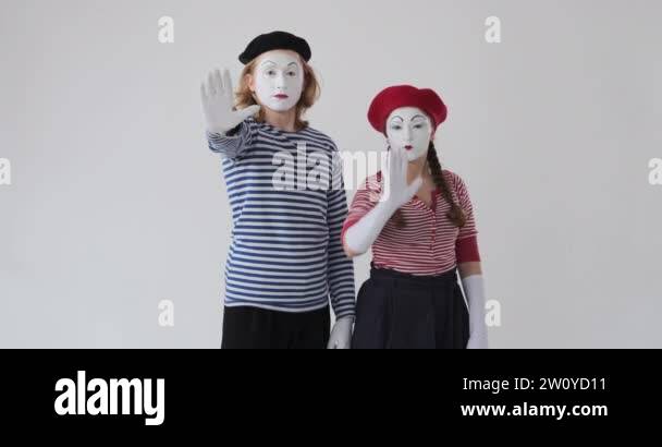 Mime artists saying no with stop hand sign Stock Video Footage - Alamy