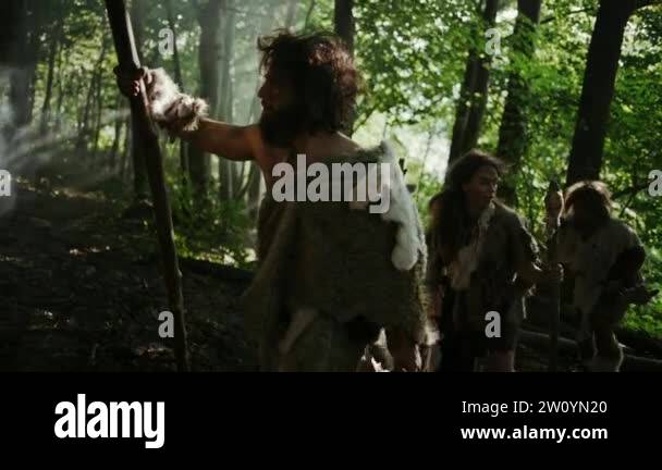 Tribe of Hunter-Gatherers Wearing Animal Skin Holding Stone Tipped ...