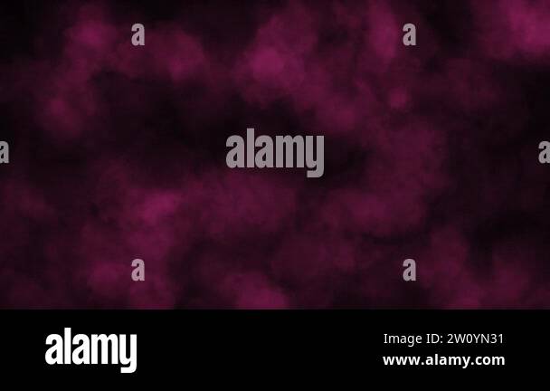 Purple puffs of magnificent smoke on an isolated black background ...