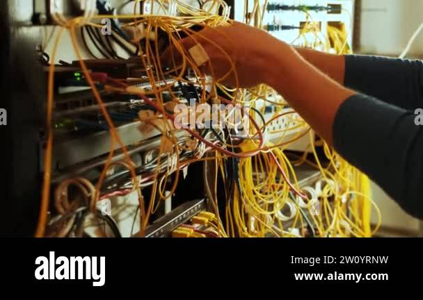 Network switch and ethernet cable in rack cabinet. Network connection ...