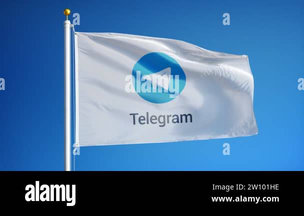 Telegram company flag waving in slow motion against blue sky, editorial ...