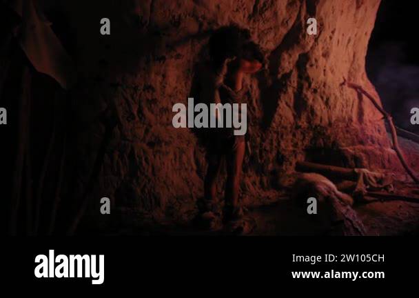 Primitive Prehistoric Neanderthal Wearing Animal Skin Draws Animals and ...