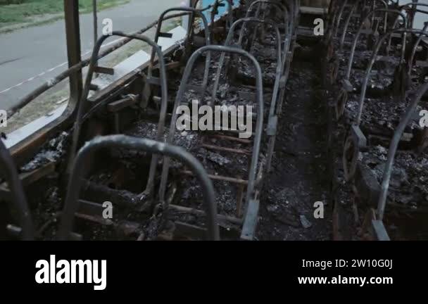 Bus after the fire. Explosion of a bomb in a passenger vehicle. The ...