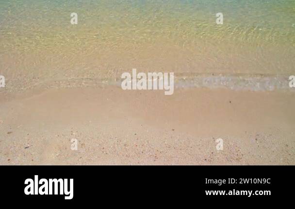 Tropical Clear Water Breaking Softly onto Pink Beach Sand Motion ...